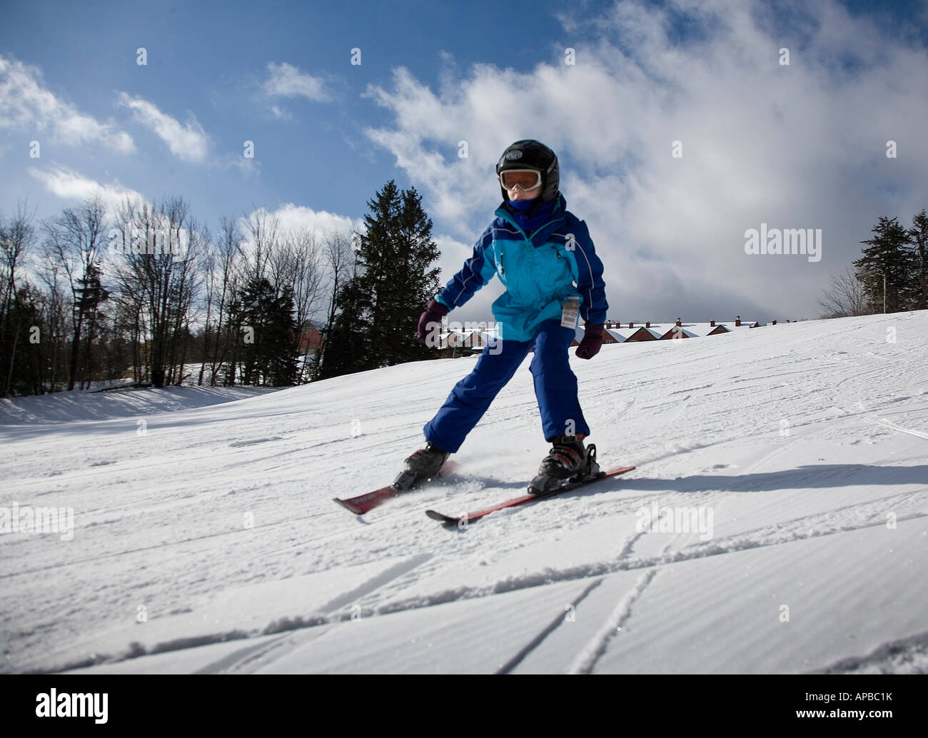Child skiing on a hill Stock Photo - Alamy