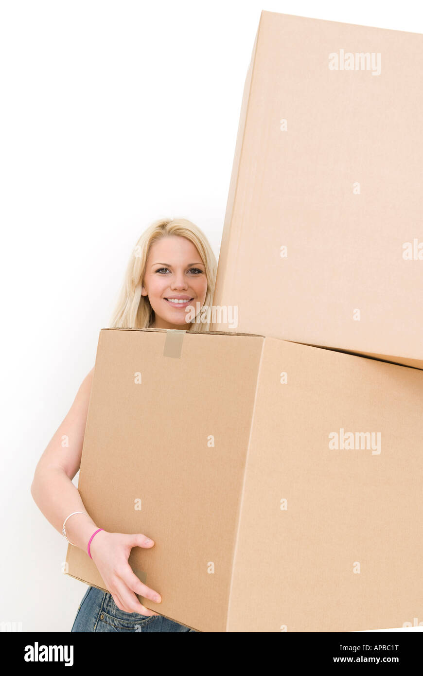 young female carrying cardboard boxes Stock Photo - Alamy