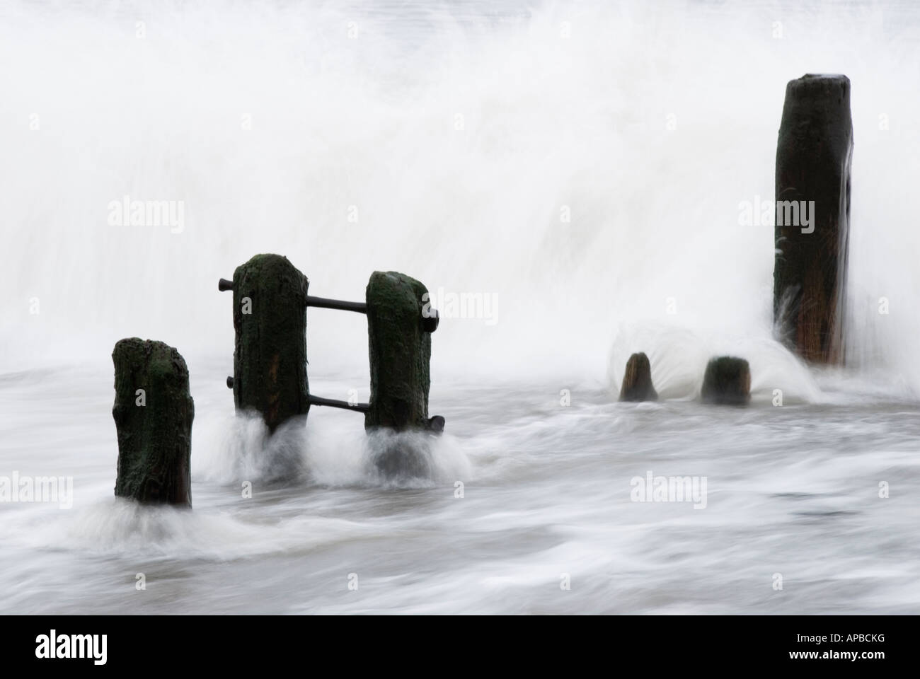 Waves washing over the groynes at Sandsend Whitby North Yorkshire ...