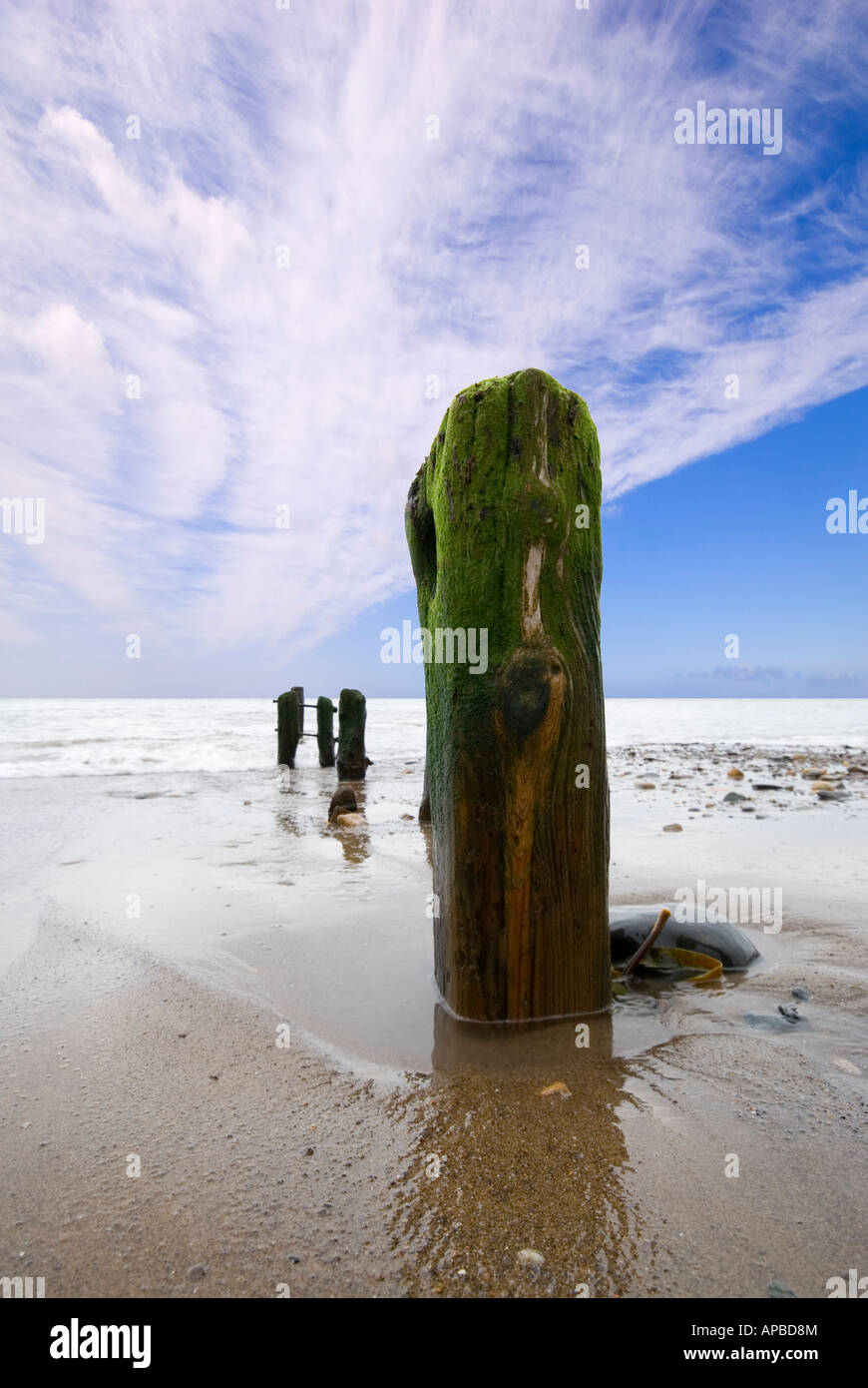 Waves washing over the groynes at Sandsend Whitby North Yorkshire ...