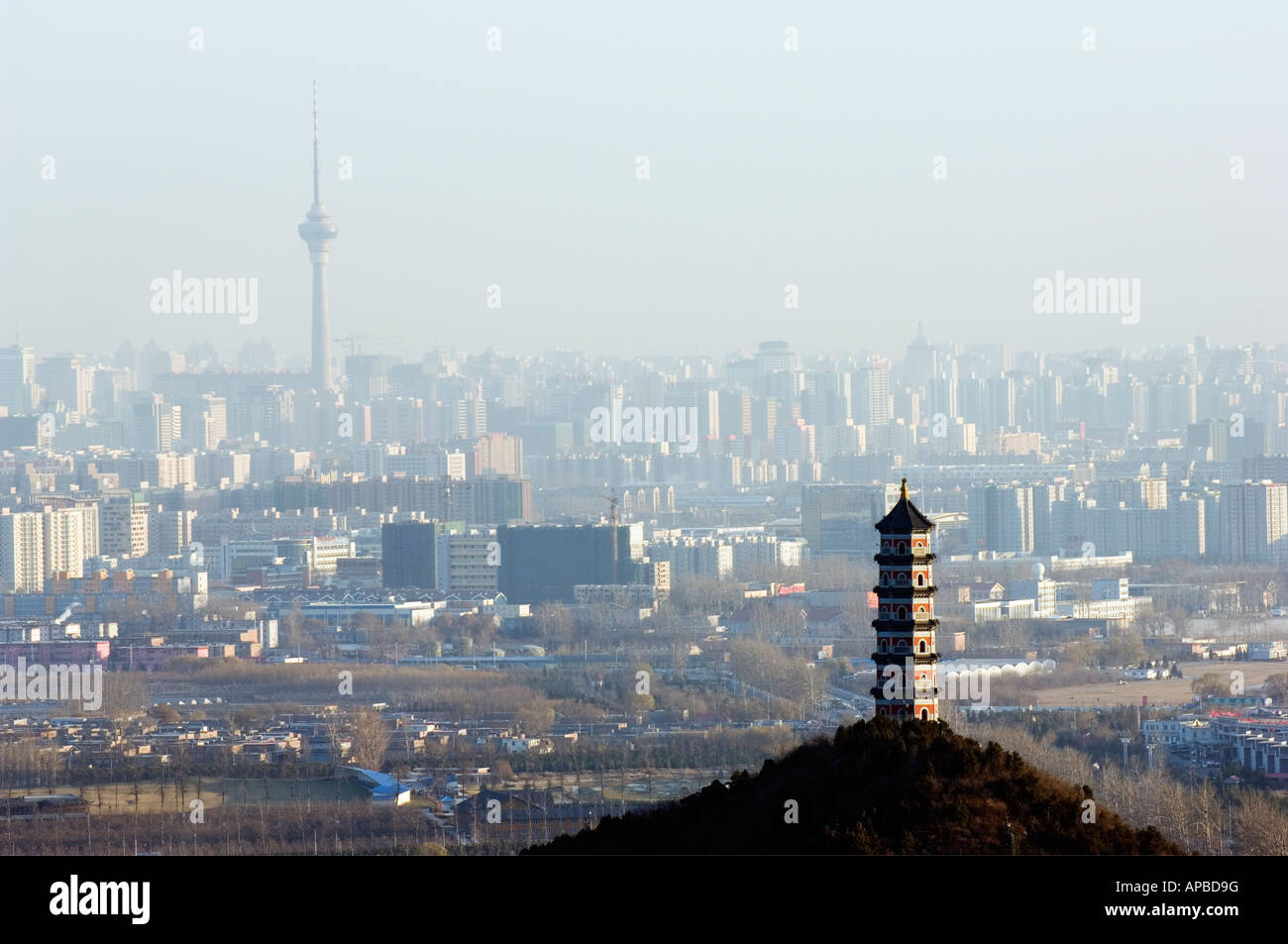 a pagoda on the grounds of Yuquan mountain overlooking the city and the ...