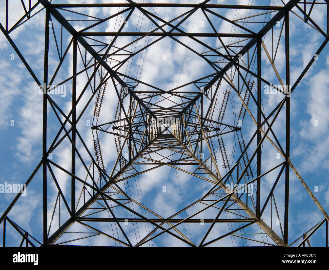 Looking up through an electricity pylon Stock Photo - Alamy