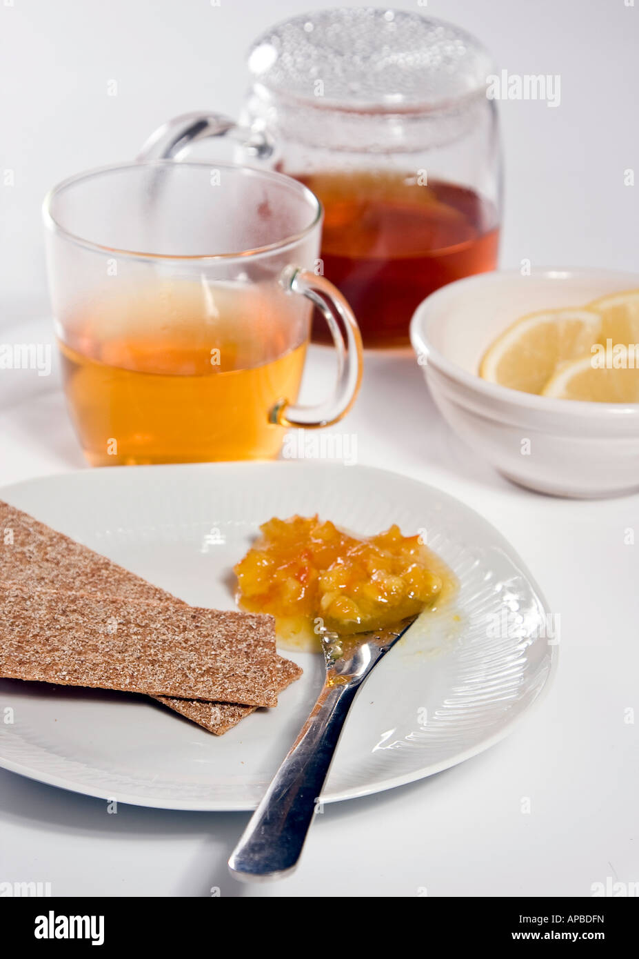 lemon tea and crackers with marmalade Stock Photo - Alamy