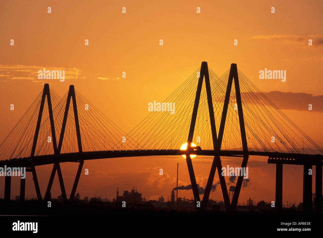 Sunset view of the Fred Hartman bridge over the Houston Ship Channel ...