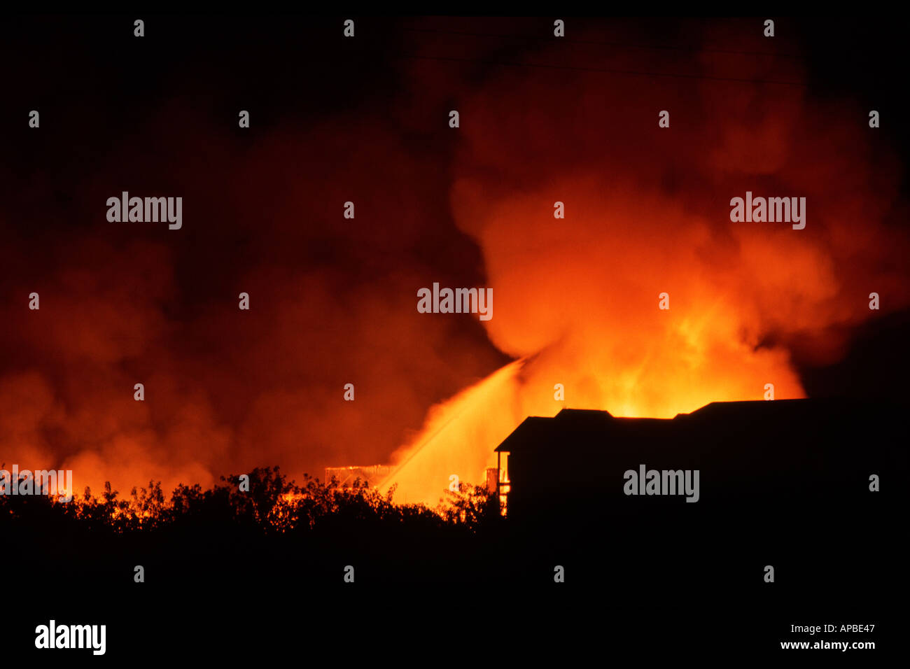 Fire at apartment building complex Stock Photo - Alamy