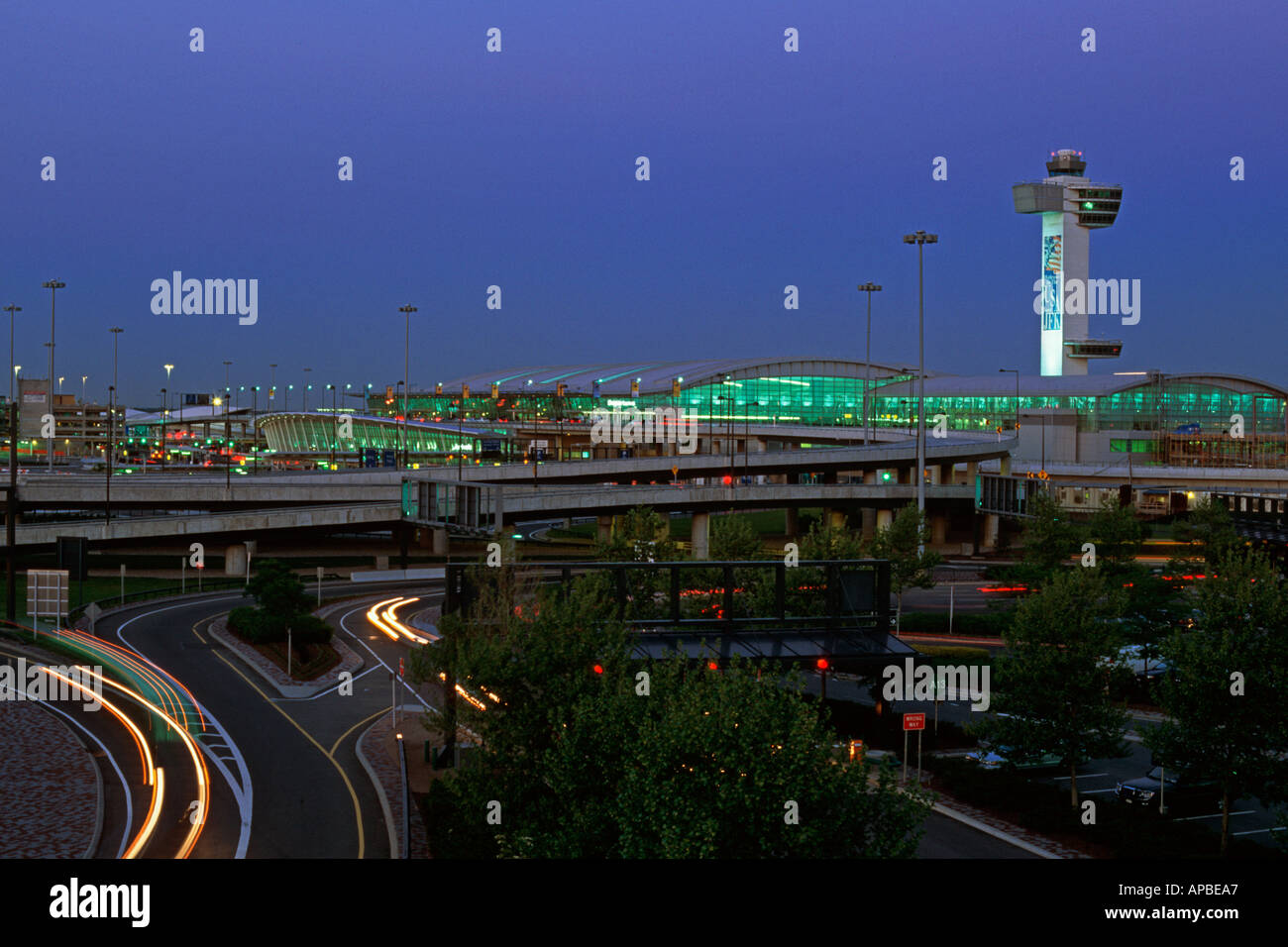 Twilight view of JFK Airport and contol tower New York Stock Photo - Alamy