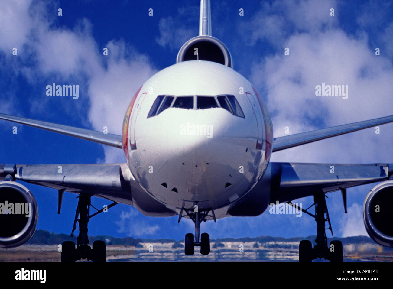 Commercial jet airliner on runway taking off Stock Photo - Alamy