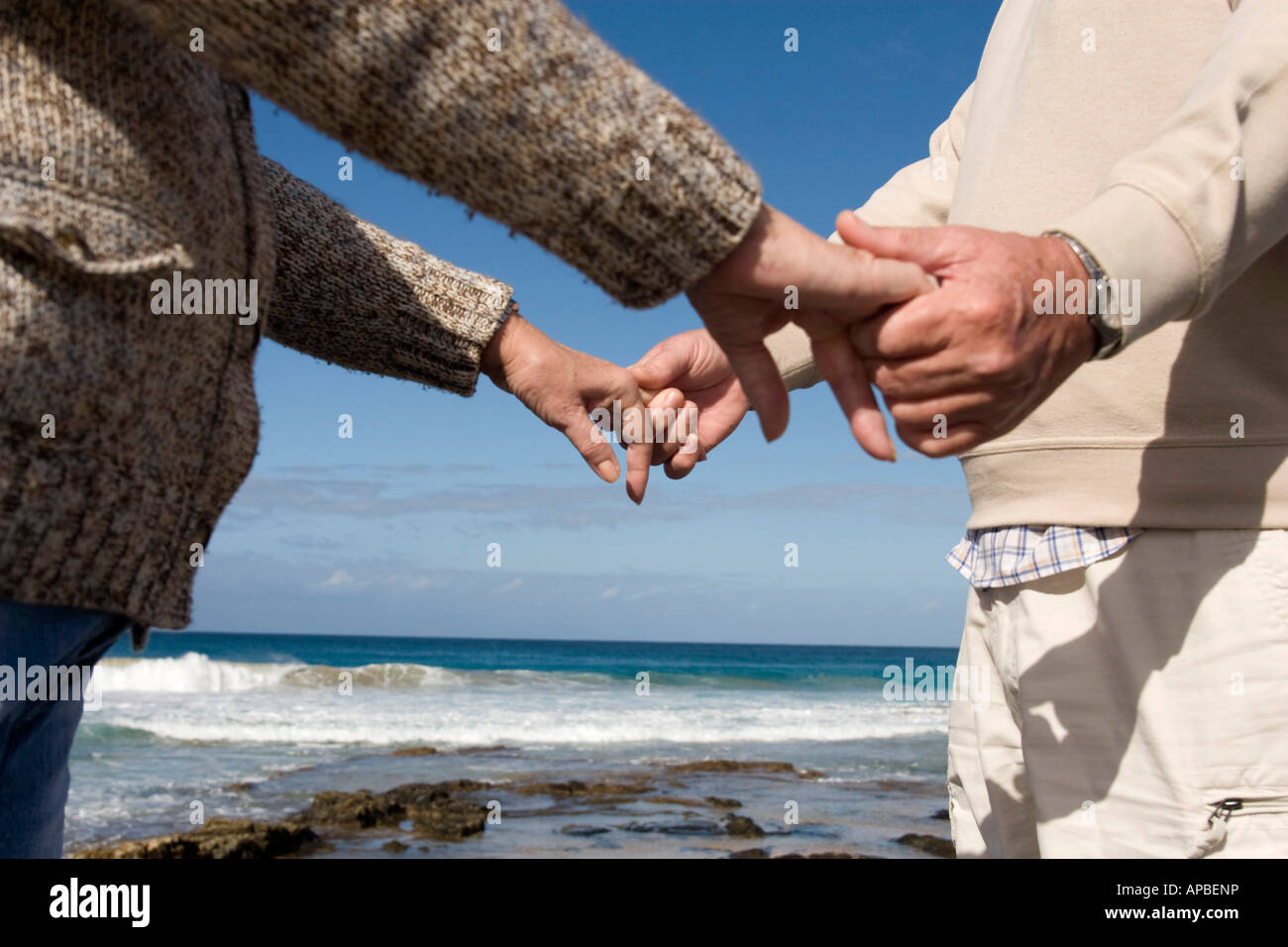 Elderly retired hands as a sign of love Stock Photo - Alamy