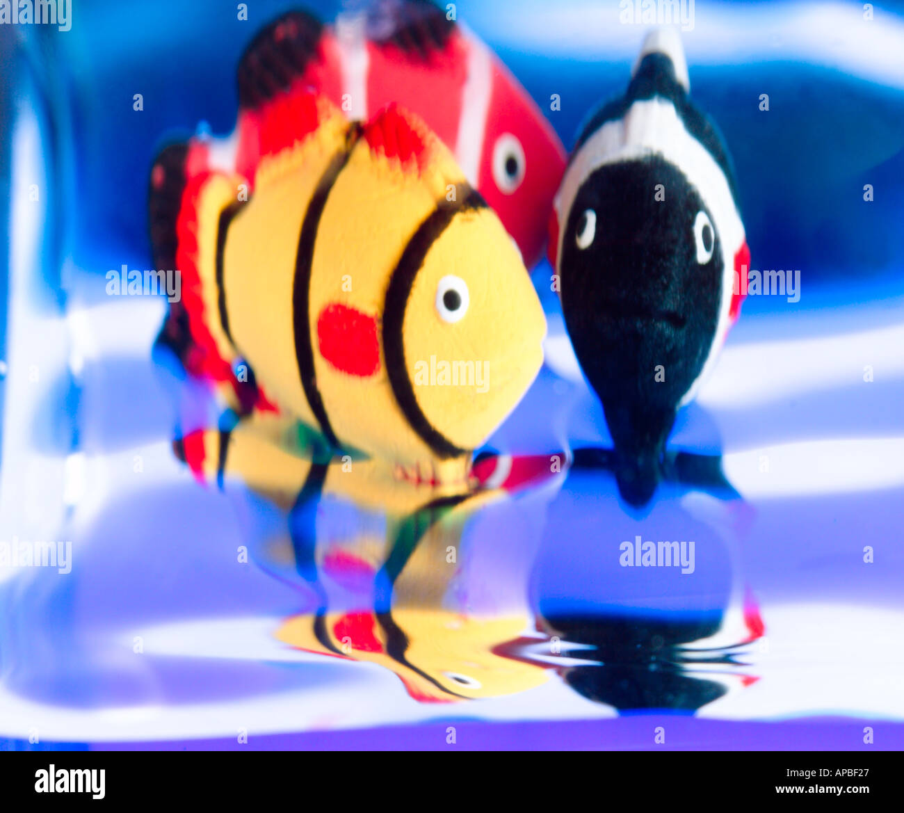 bright plastic clown fish water toy play tropical Stock Photo - Alamy