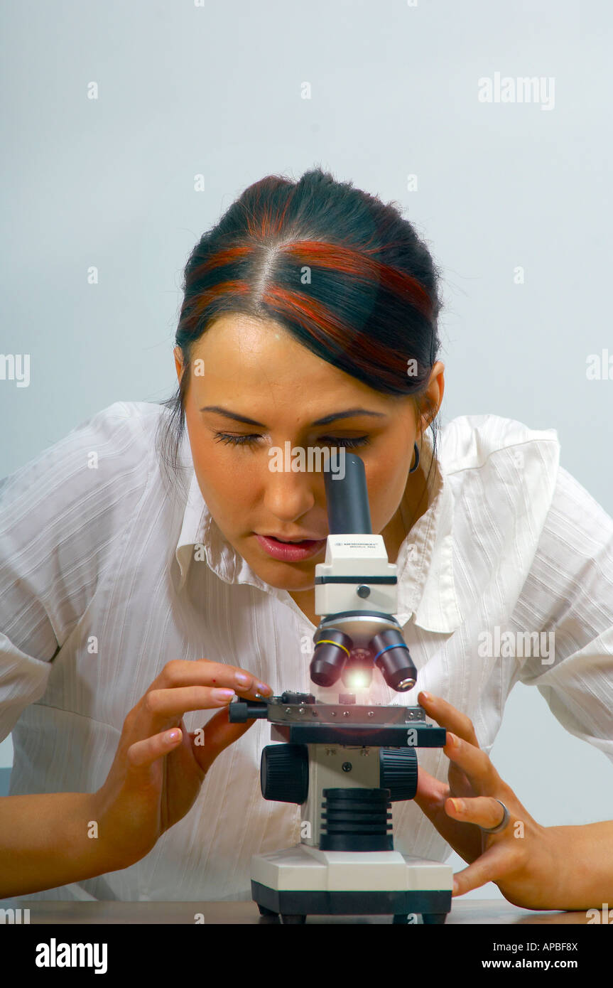 young woman with microscope Stock Photo - Alamy