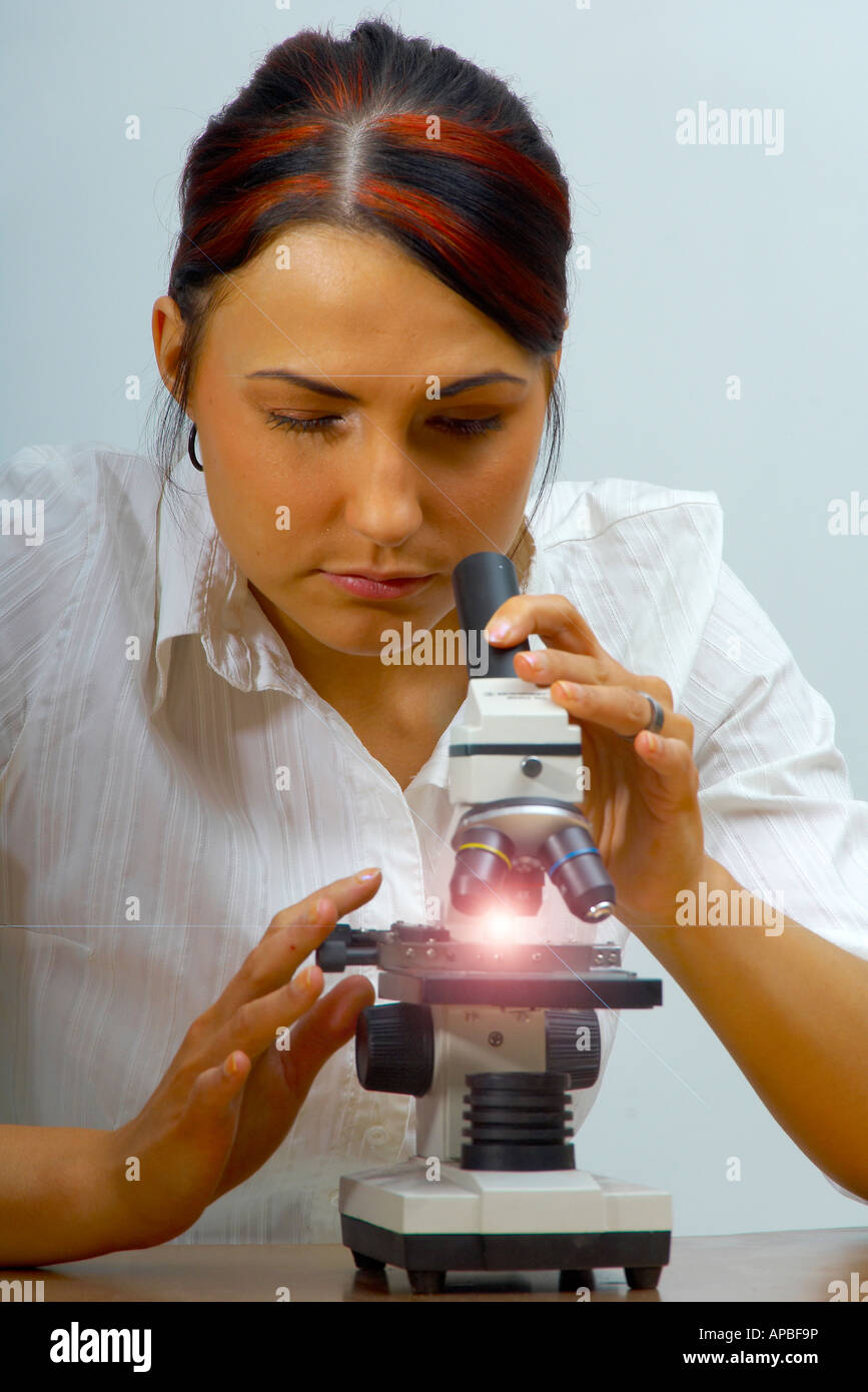 young woman with microscope Stock Photo - Alamy