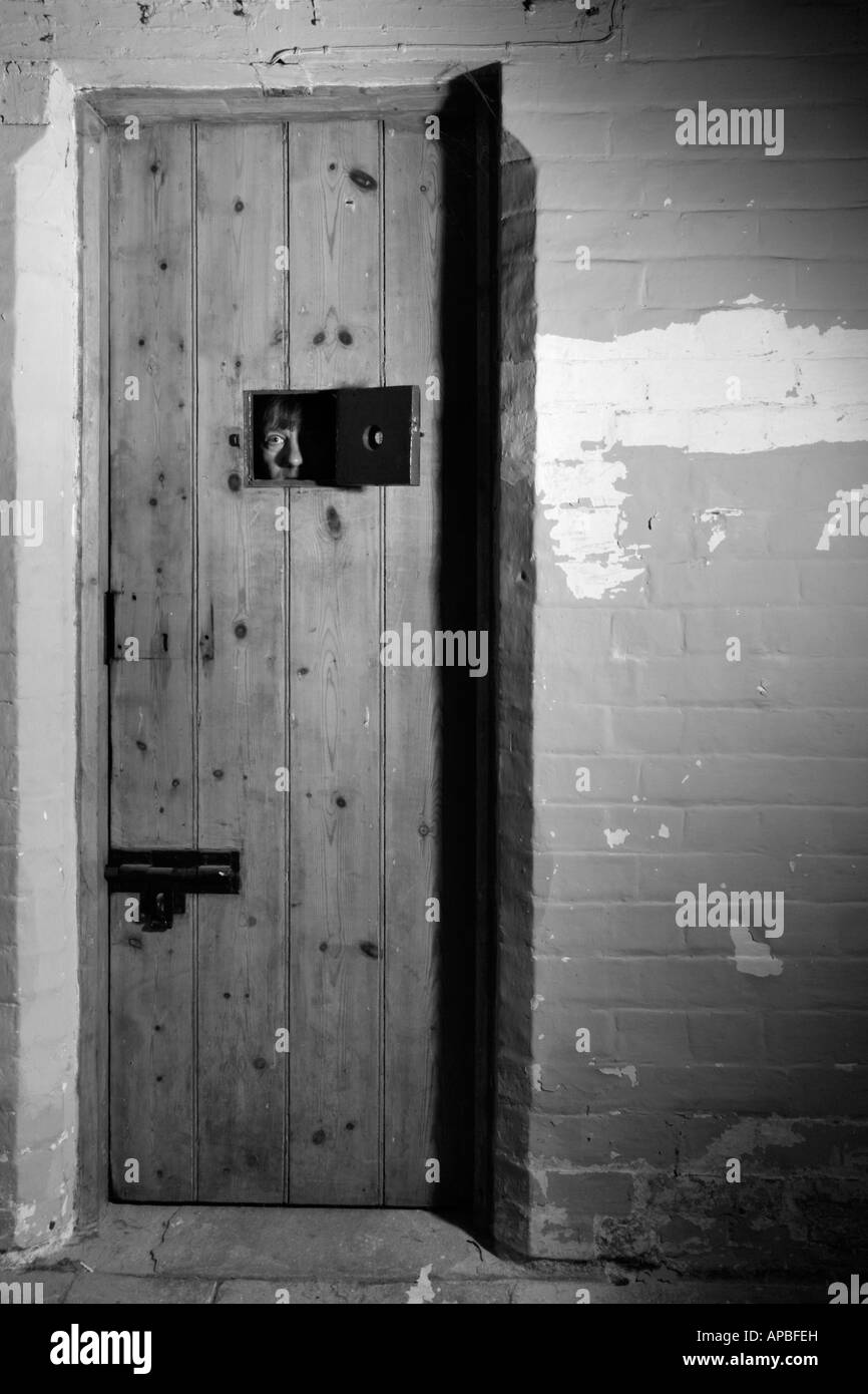 Prison door hatch Black and White Stock Photos & Images - Alamy