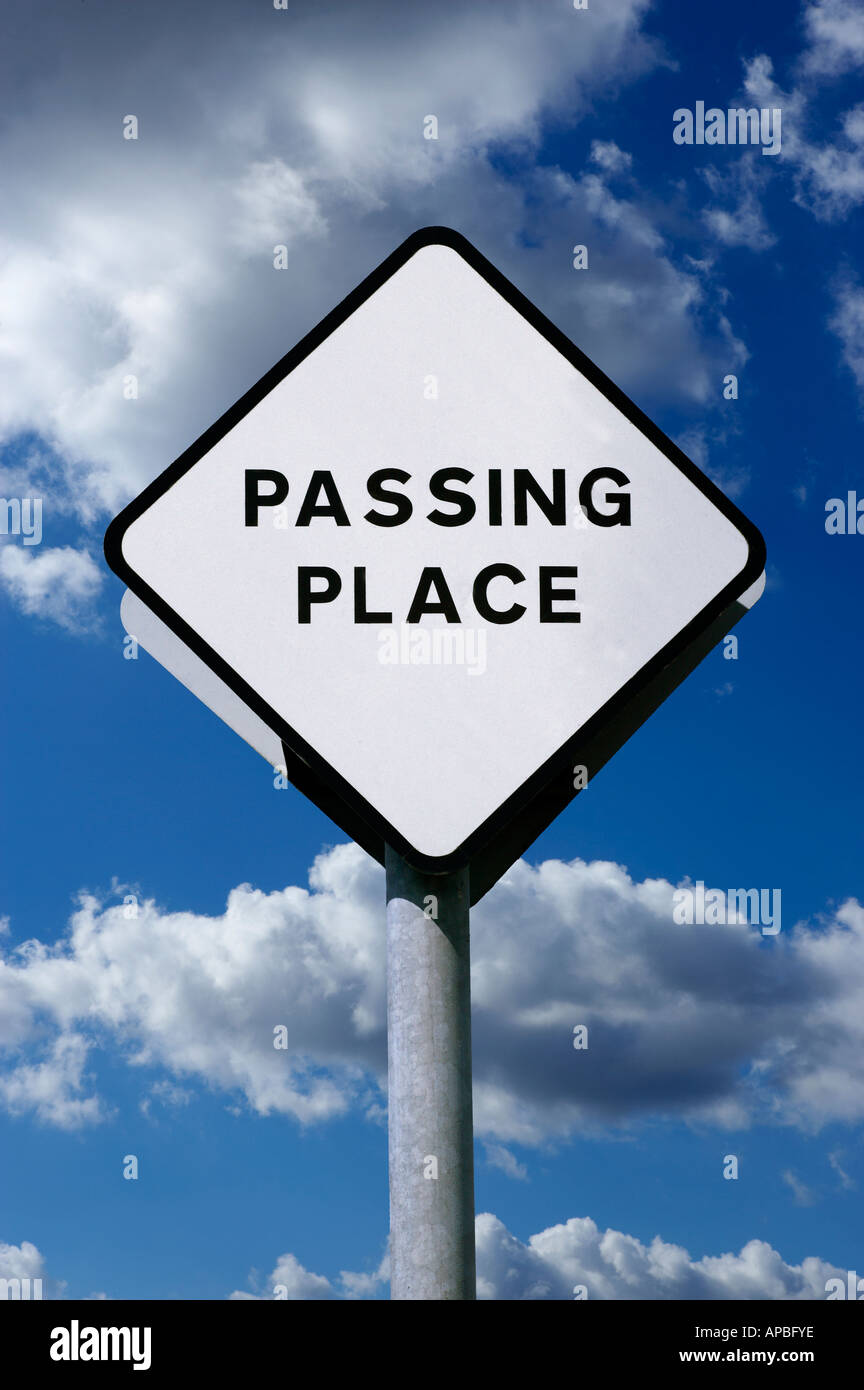 ROAD TRAFFIC PASSING PLACE INFORMATION SIGN WITH BLUE SKY BACKGROUND ...