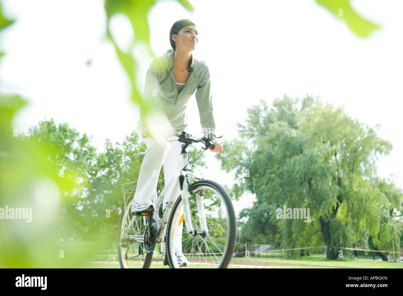 woman riding on bicycle Stock Photo - Alamy