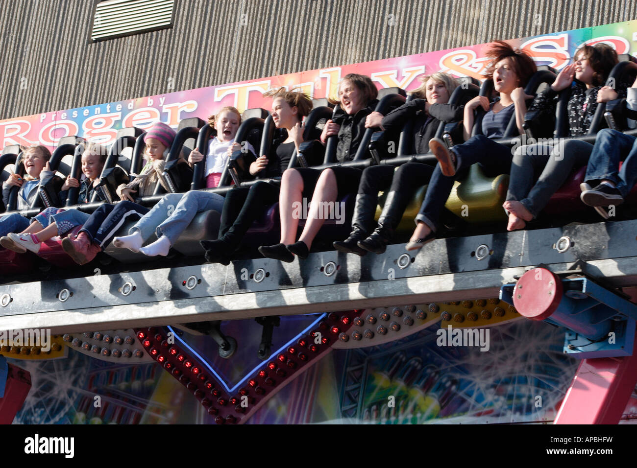 People riding on a Miami Trip ride at the fairground, UK Stock Photo ...