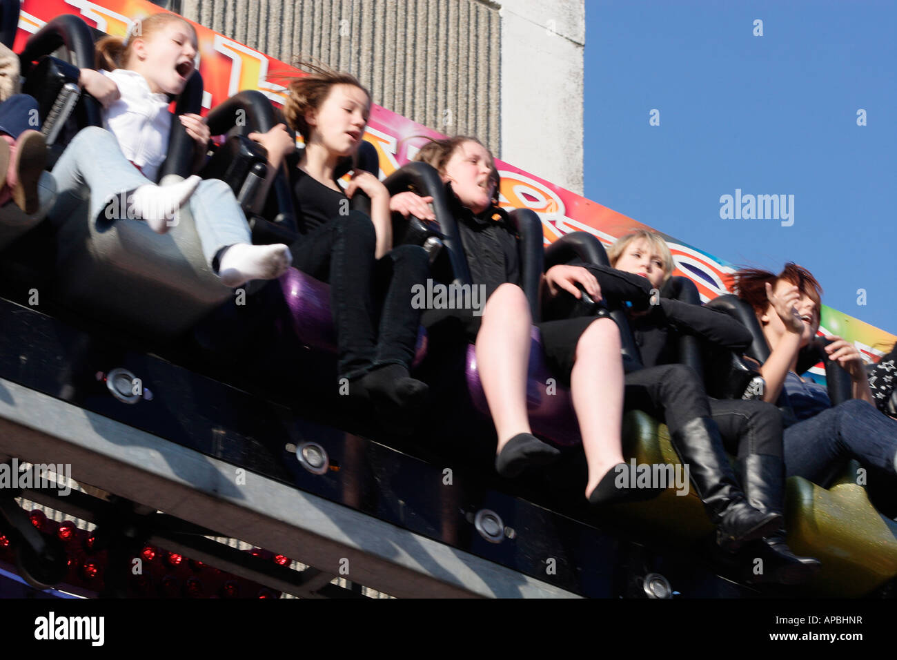 People riding on a Miami Trip ride at the fairground, UK Stock Photo ...