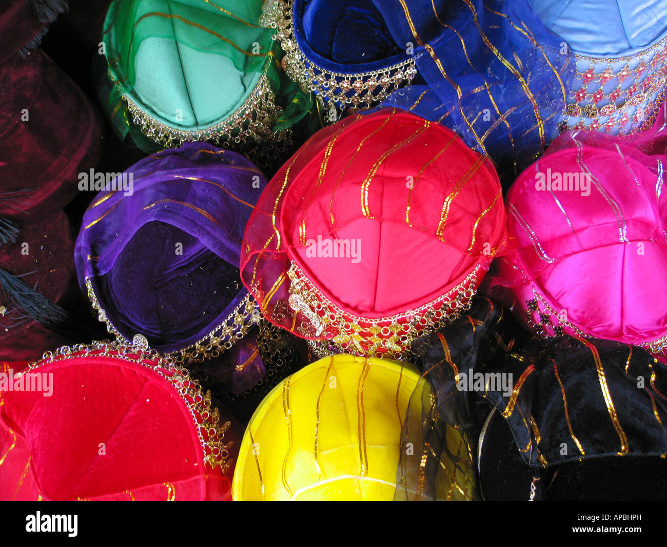 An overhead view of colourful decorated traditional head dresses on a ...