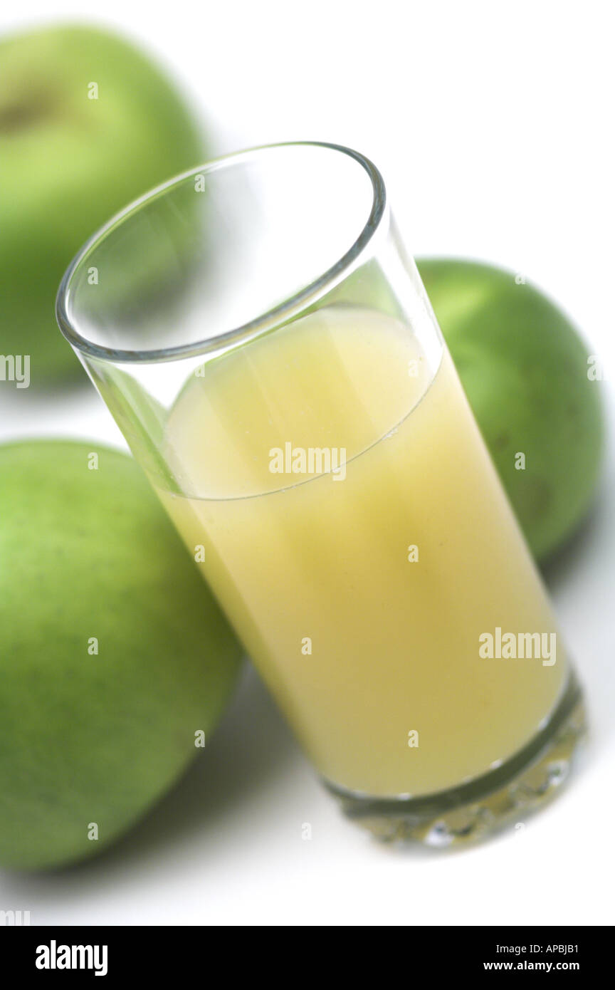Cloudy Apple Fruit Juice drink with Apples Stock Photo - Alamy