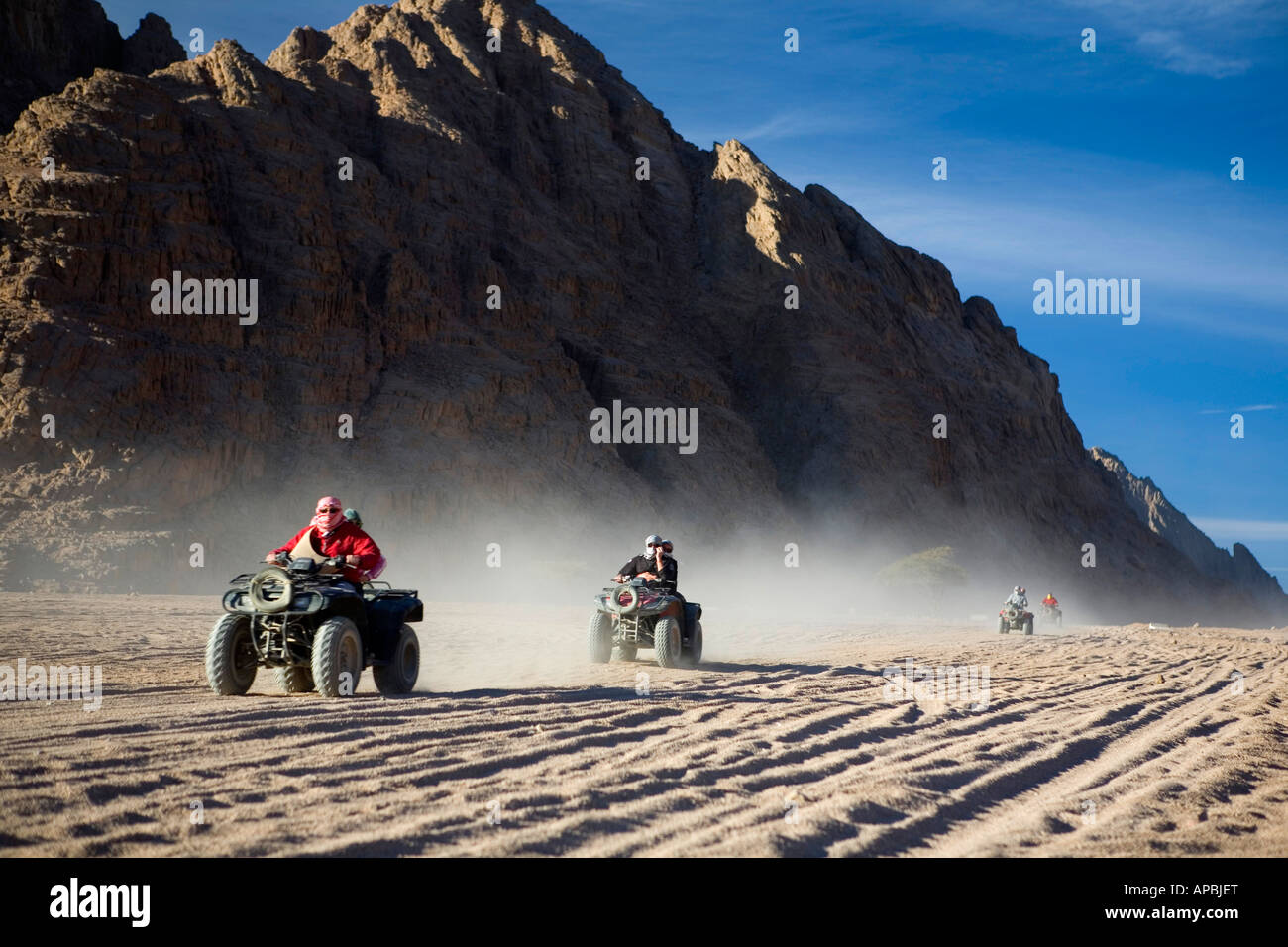 Quad Bike riders travel through the Sinai desert near Sharm el Sheikh ...