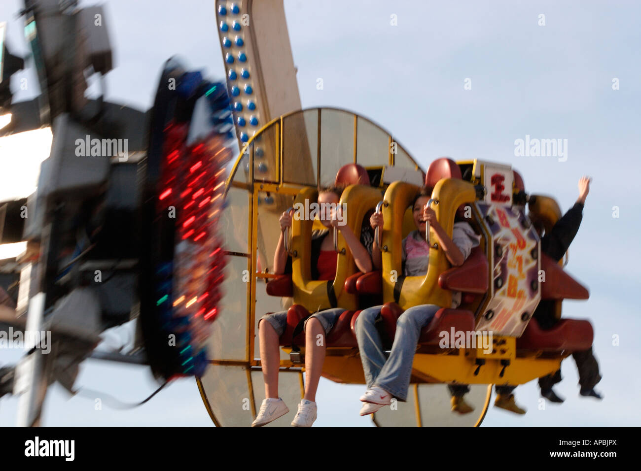 Carnival ride fair arm adrenaline hi-res stock photography and images ...