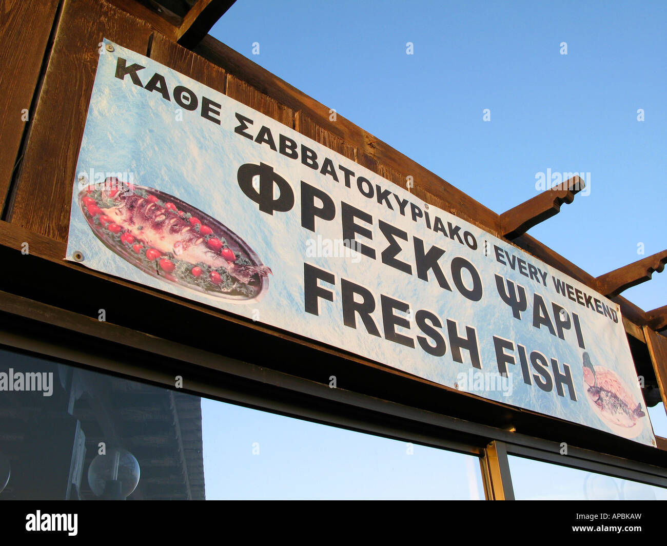 Beach sign for fresh fish restaurant at Pernera on the Eastern ...