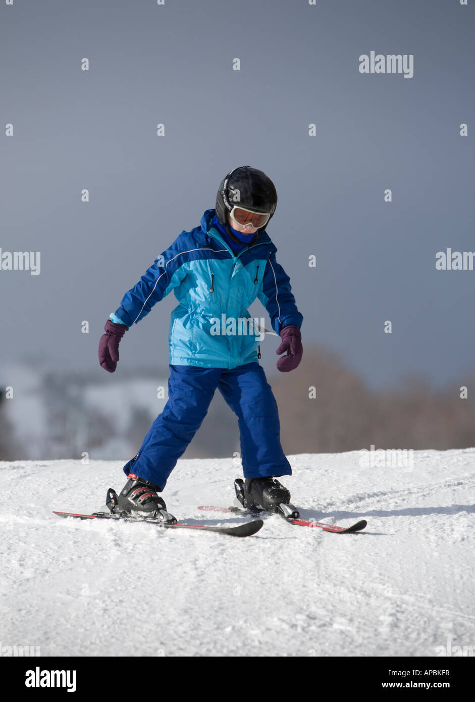 Child skiing on a hill Stock Photo - Alamy
