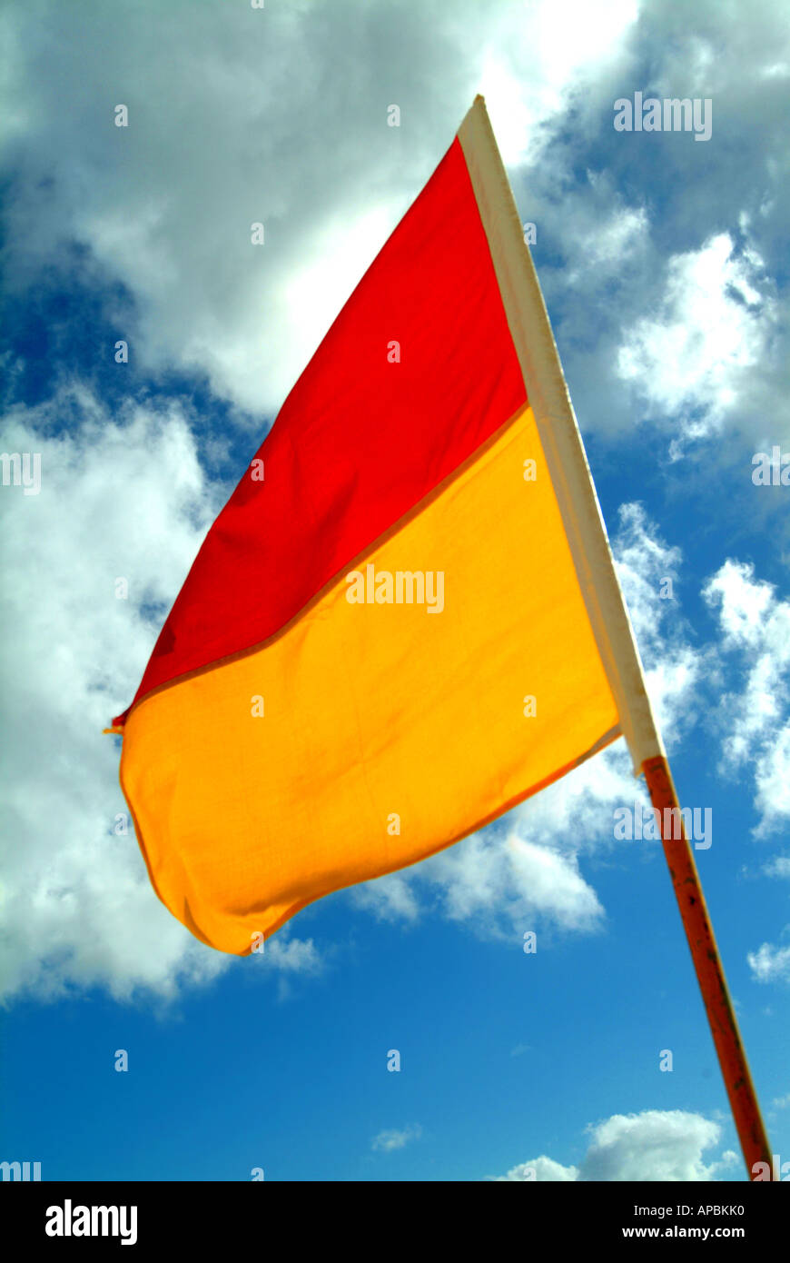 A warning to swimmers to swim between the flags on a Queensland surf ...