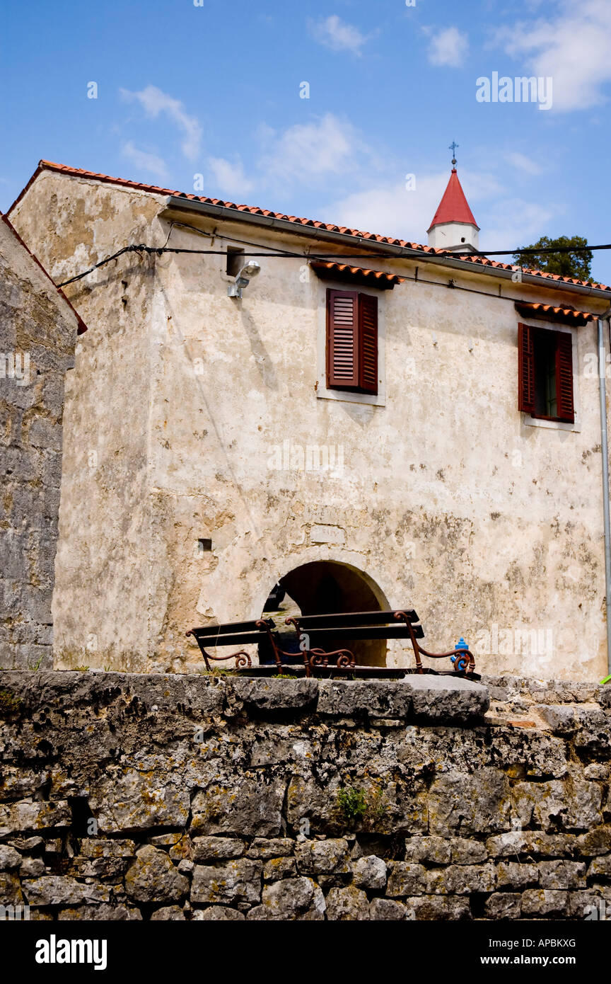 Bench, house, tower Stock Photo - Alamy