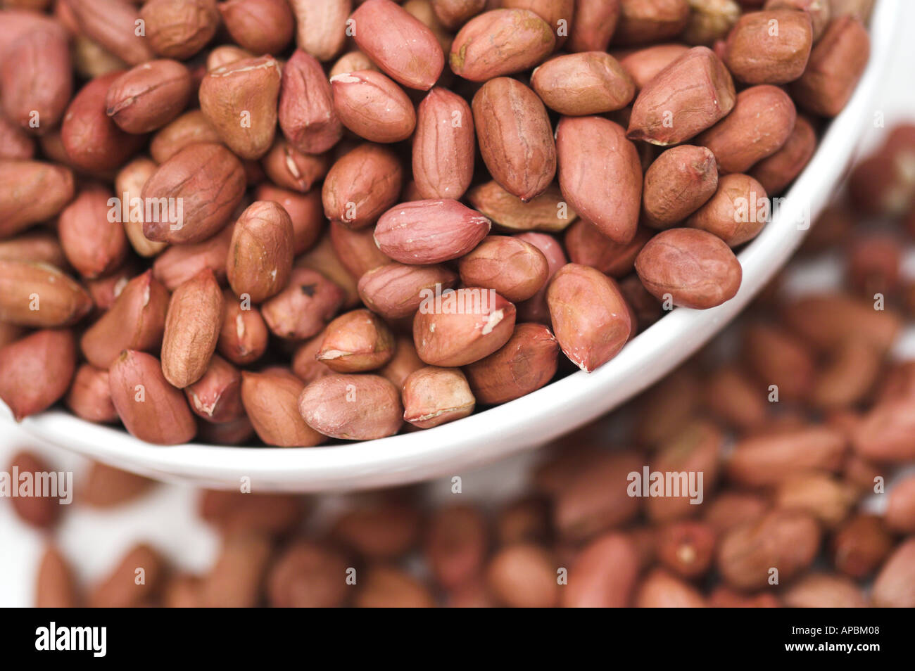 Red skin peanuts hi-res stock photography and images - Alamy