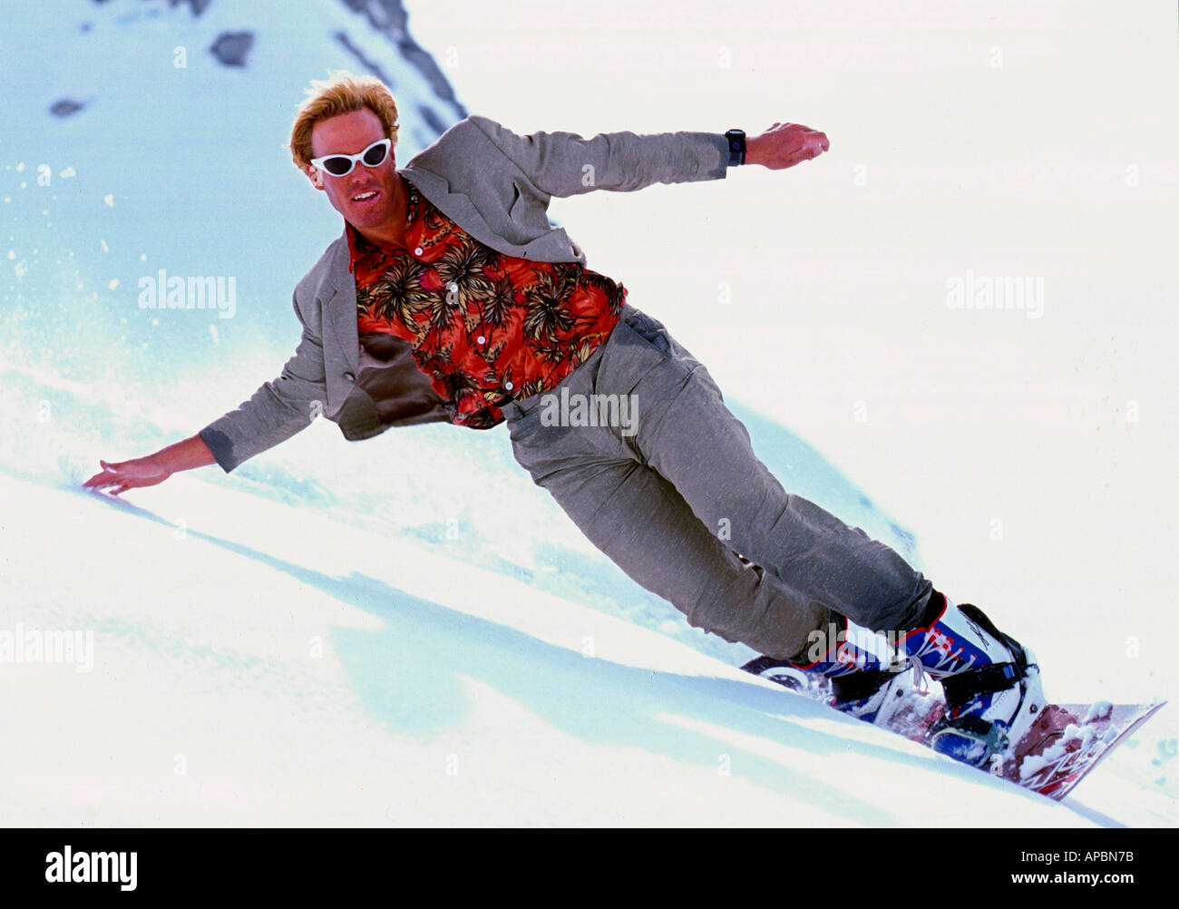 Extreme Suits feature snowboarding Stock Photo - Alamy