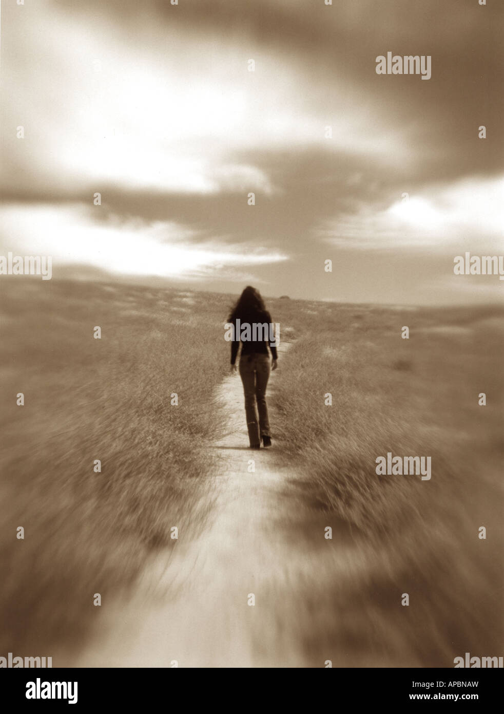 lone woman walks away on dirt path black and white wander lost walk ...