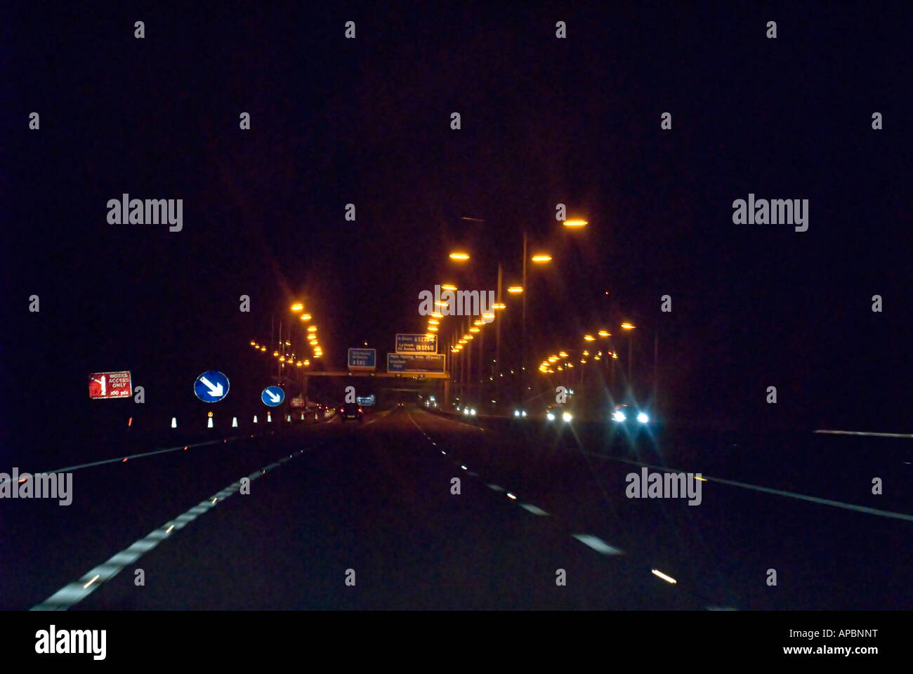 Motorway exit night Stock Photo - Alamy