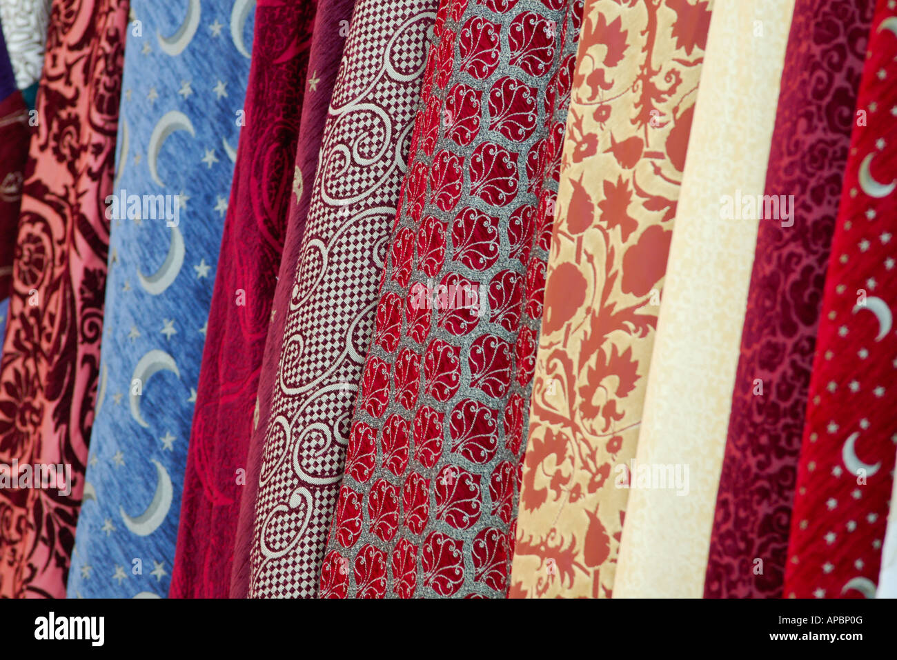 Close up view of traditional Turkish patterned fabrics for sale on a ...