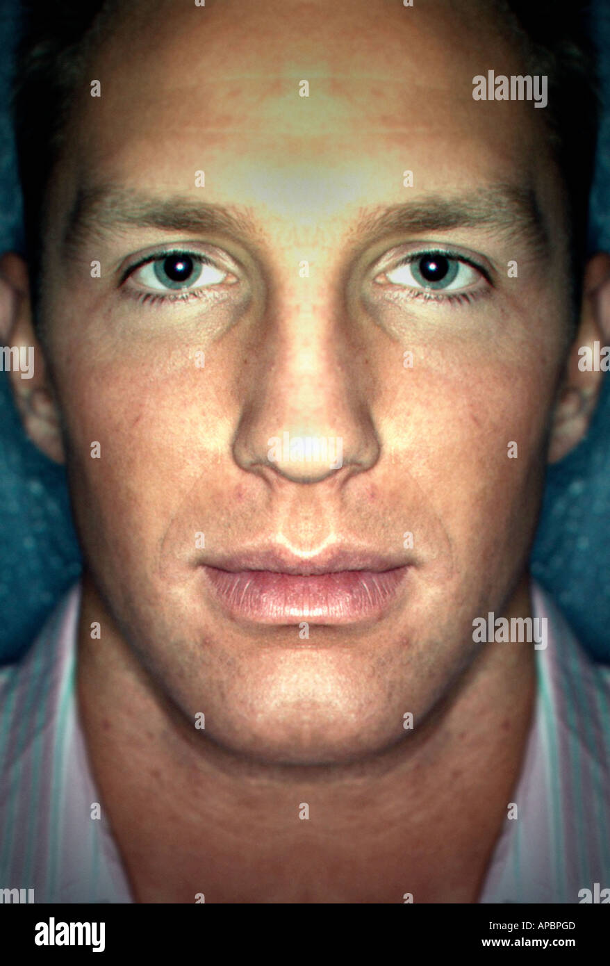 Tightly Cropped Head and Shoulders Portrait of Young Man Looking into ...