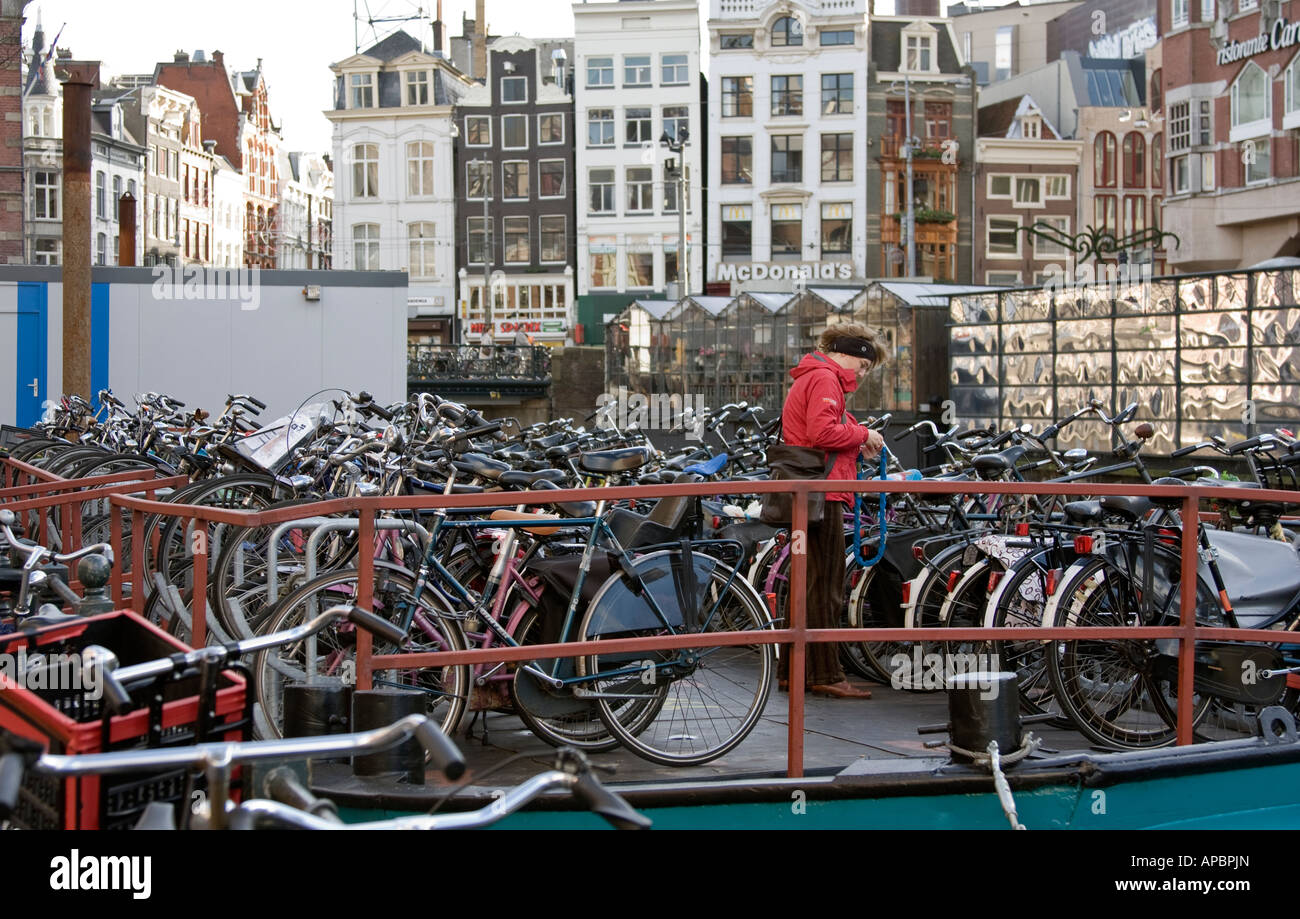 Floating bike barge on cannal in Amsterdam Holland Stock Photo - Alamy