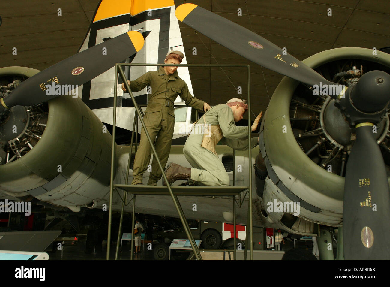 Mechanics working on WW2 US Bomber Imperial War Museum Duxford Stock ...
