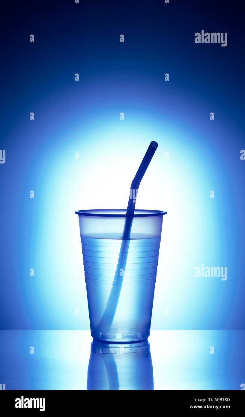 Plastic cup with water and straw Stock Photo - Alamy