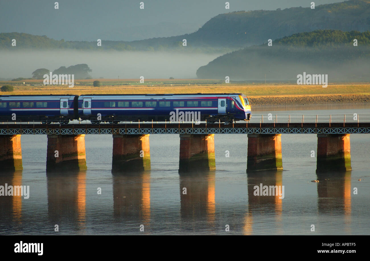 Early morning train on Kent viaduct, Arnside, Cumbria, UK Stock Photo ...