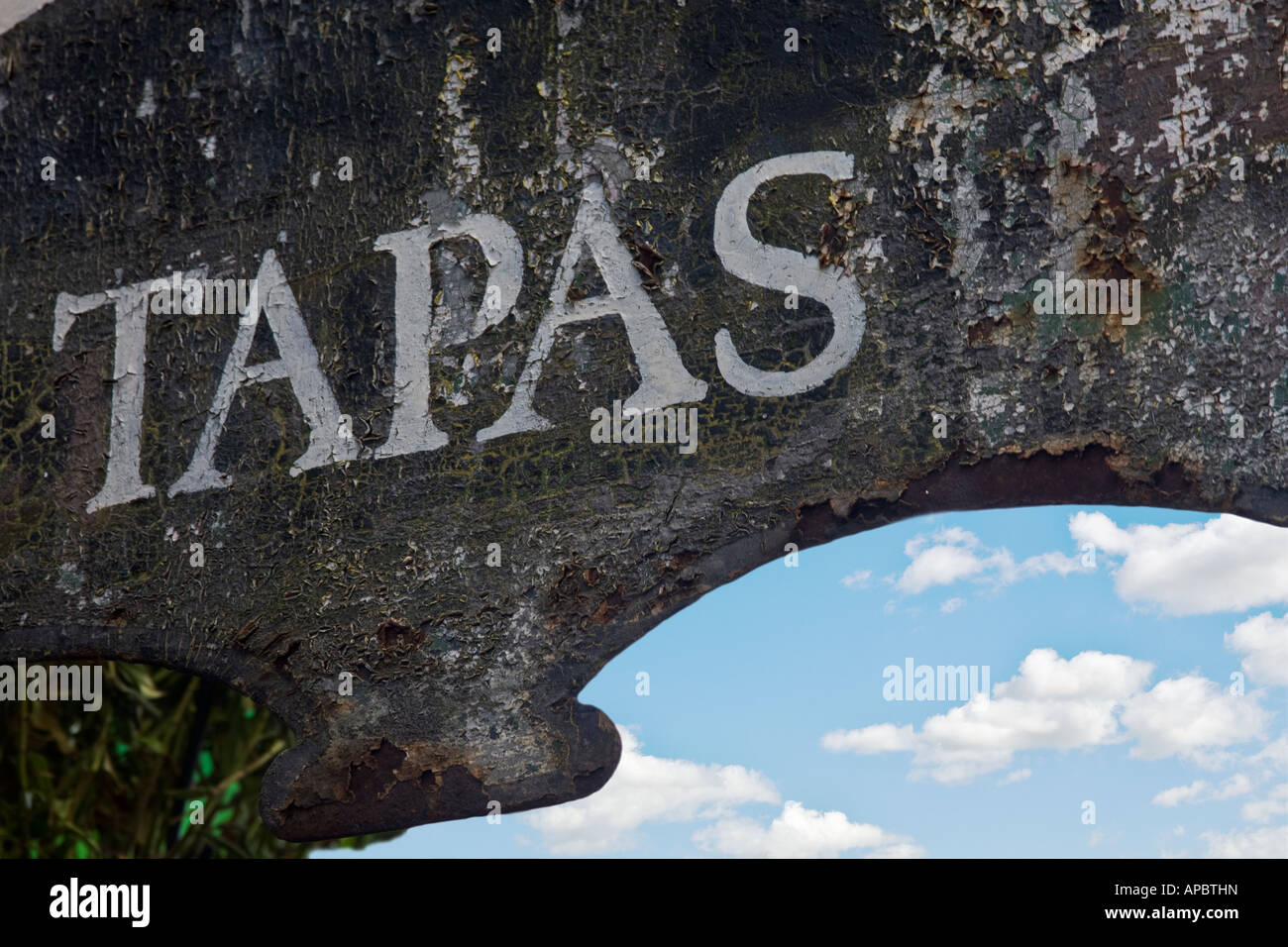 Wooden sign outside of Tapas restaurant bar Stock Photo - Alamy