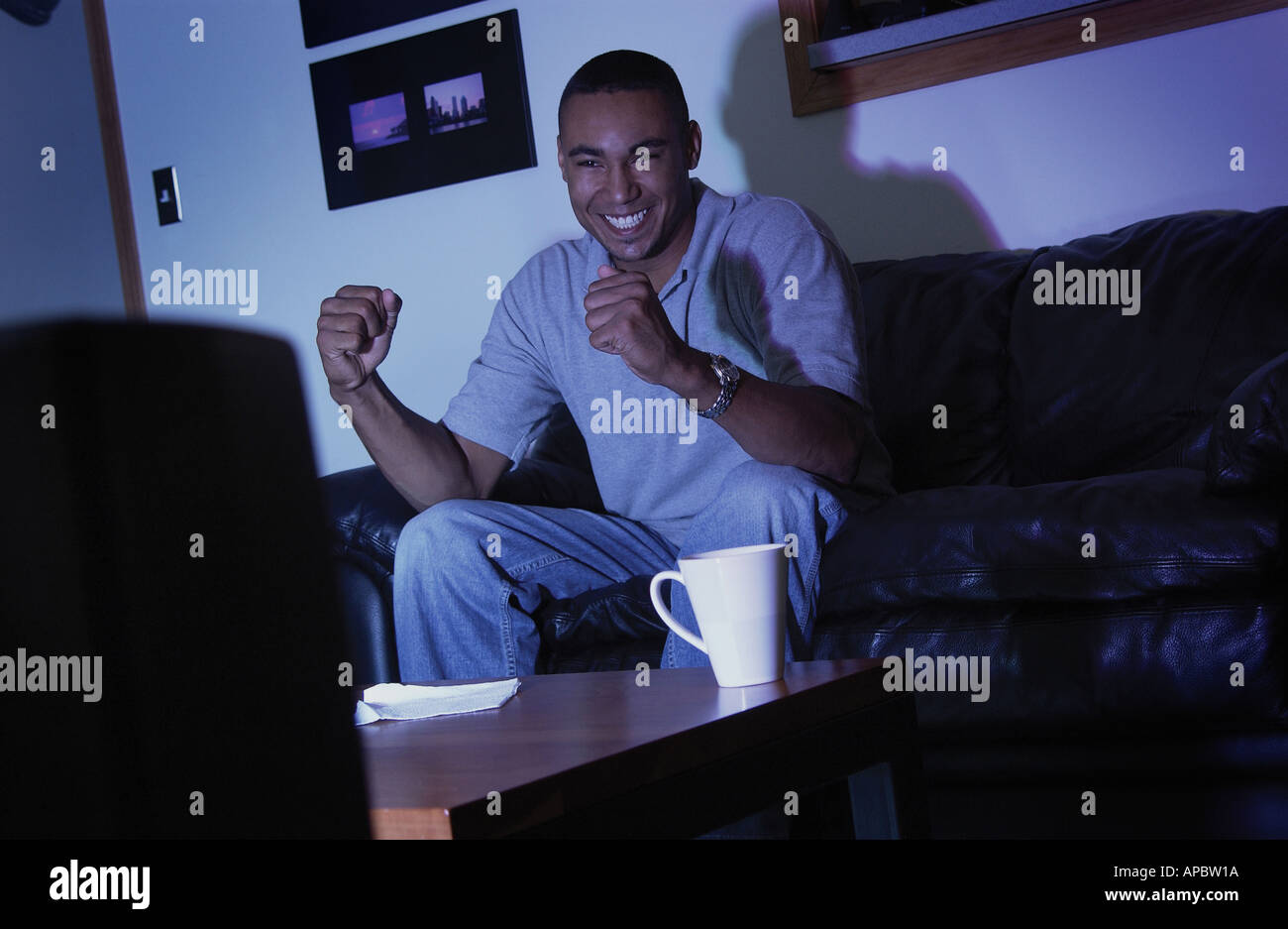 Man watching TV Stock Photo - Alamy