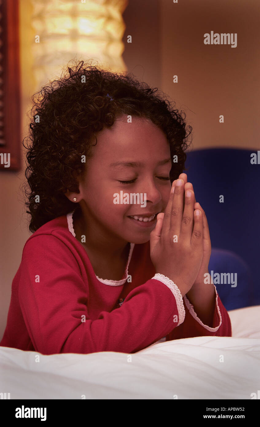 Girl praying bedtime hi-res stock photography and images - Alamy