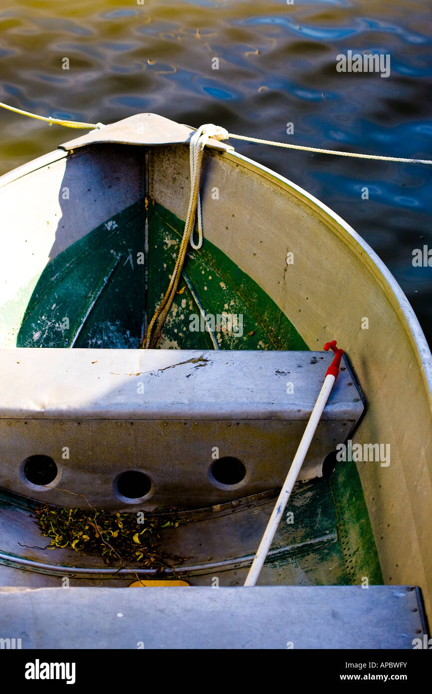 An aluminum boat tied up at the dock Stock Photo - Alamy