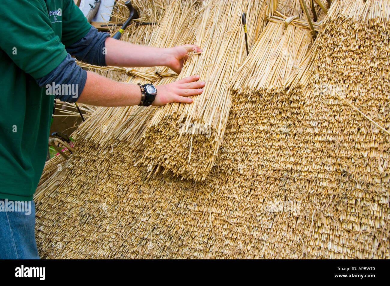 Thatcher Work On Cottage In High Resolution Stock Photography and ...