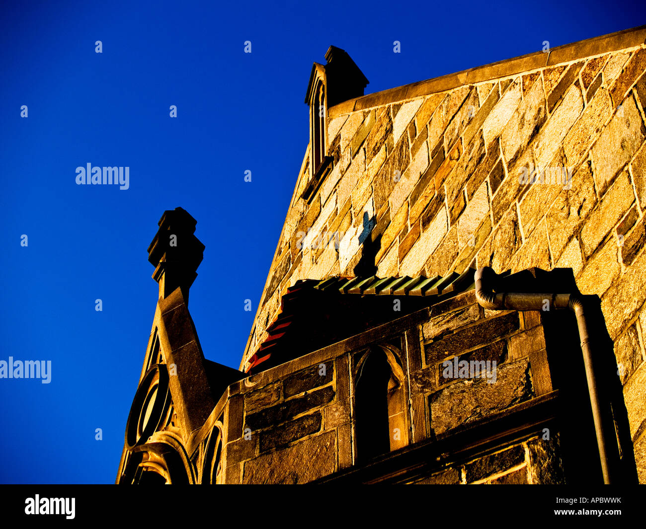 Dual rooflines on the facade of an historic building with exposed ...