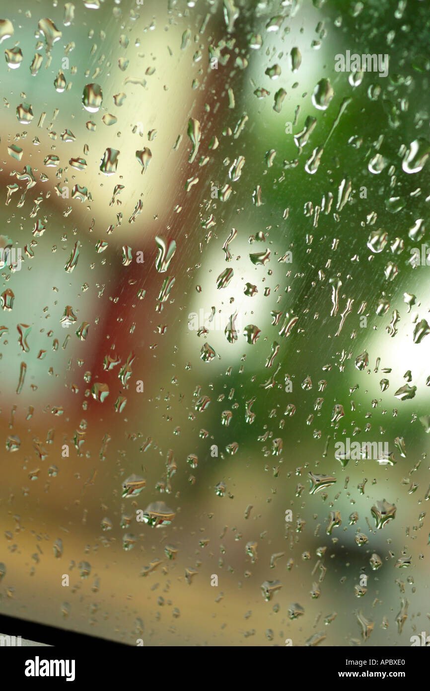 Traffic seen through wet windows Stock Photo - Alamy