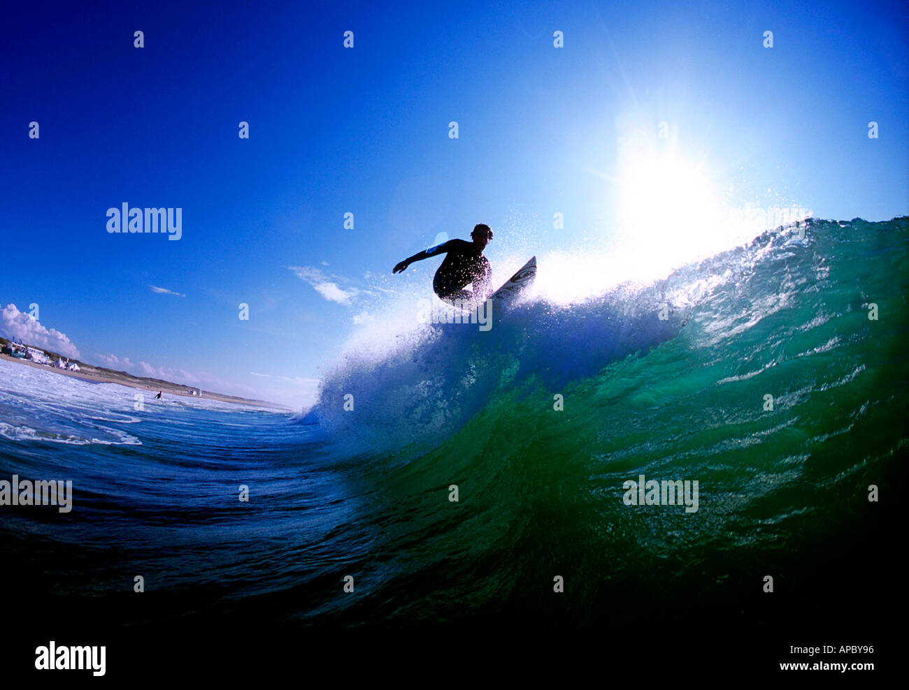 Silhouette of surfer on wave with sunlight, Gabe Davies in Hossegor ...