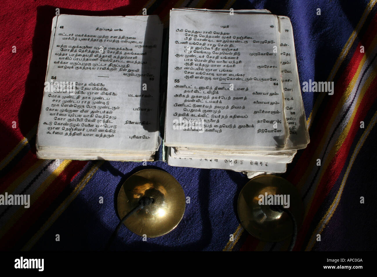 Hindu hymn book and cymbals at a temple in India Stock Photo - Alamy