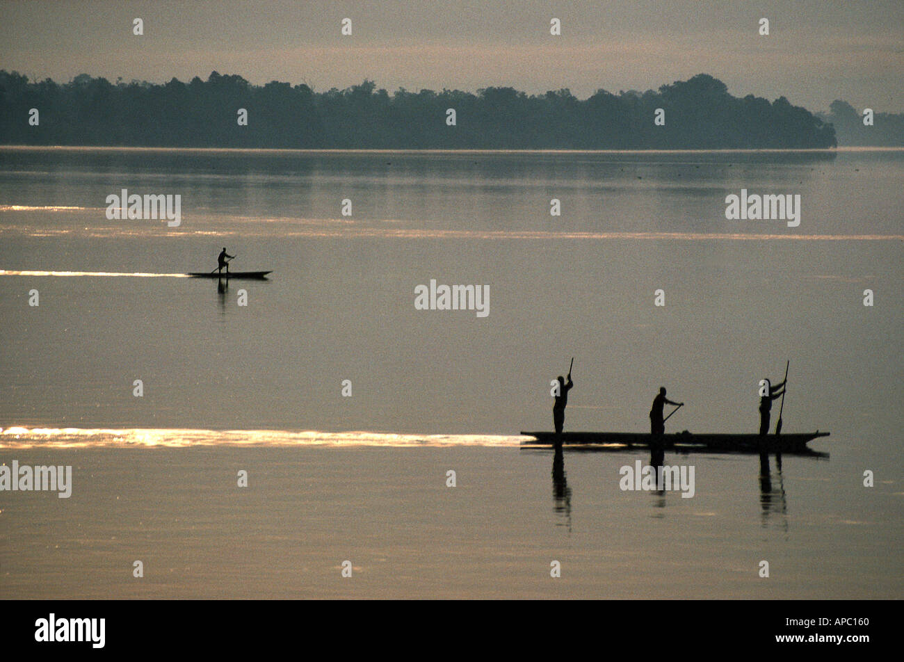Pirogues dugouts at Sunrise Congo Zaire River D R Congo Central Africa ...