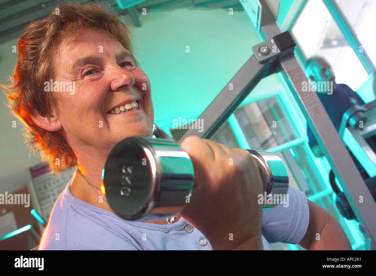 Old lady lifting weights Stock Photo - Alamy