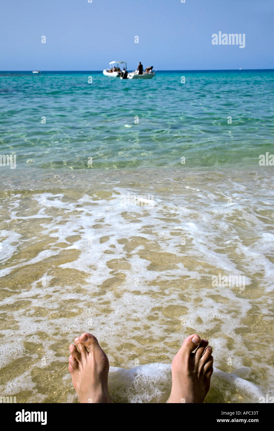 Relaxing at Cala Vella. Mallorca Island. Spain Stock Photo - Alamy